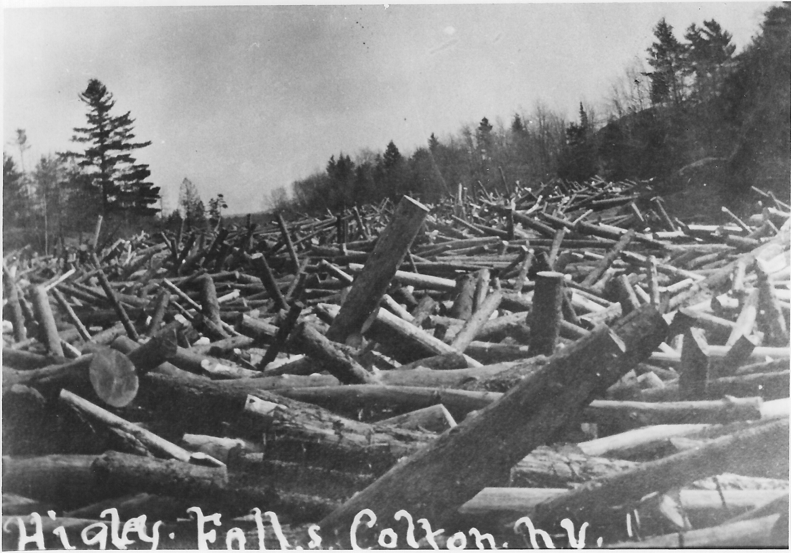 Loggers breaking up a log jam on the Grasse River in Pyrites