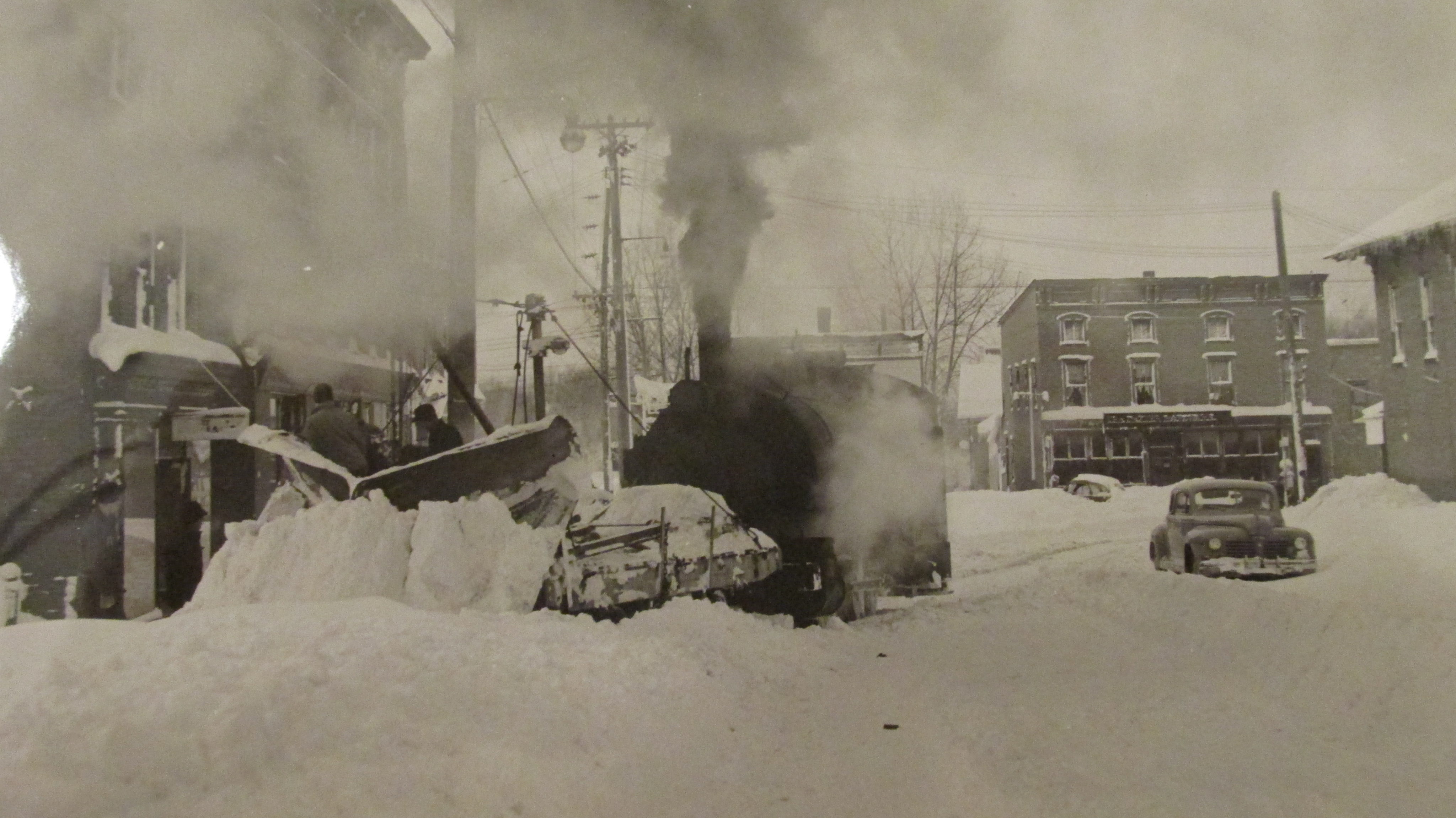 Train plowing snow in Dexter