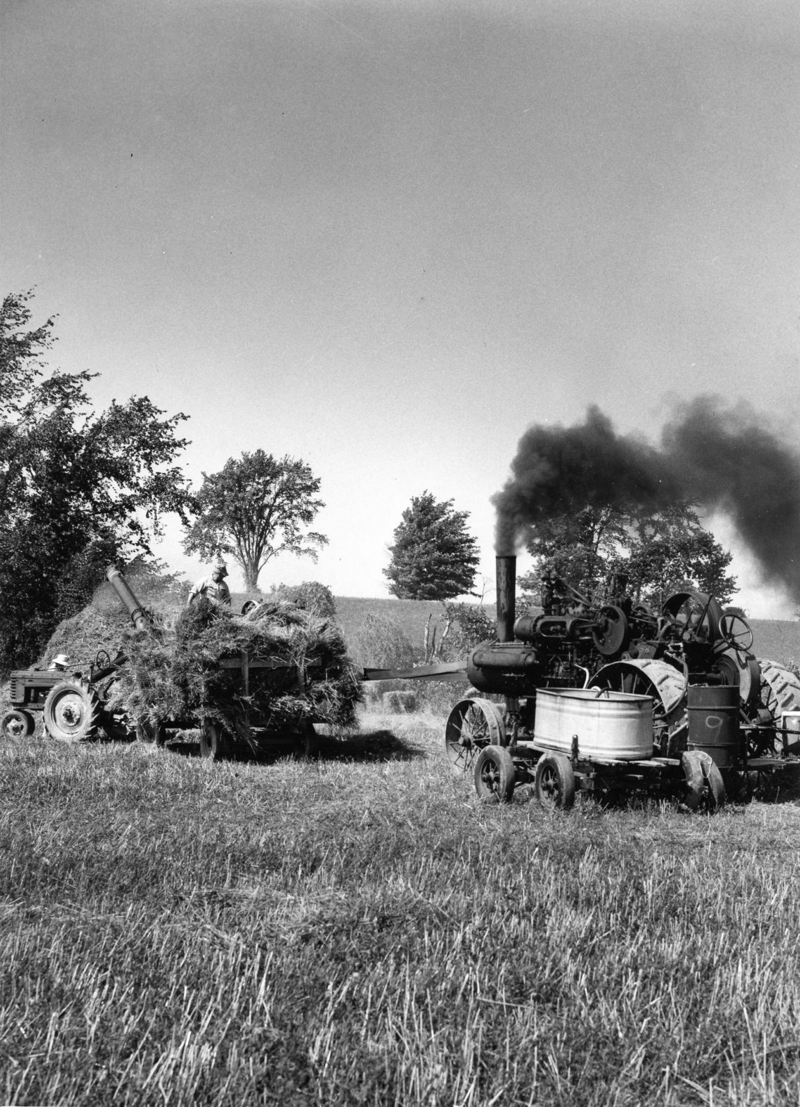 Steam powered threshing machine near Watertown
