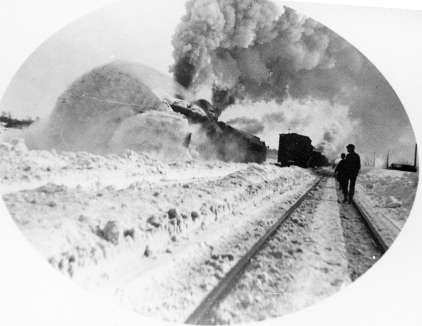 Rotary snowplow clearing tracks in Carthage