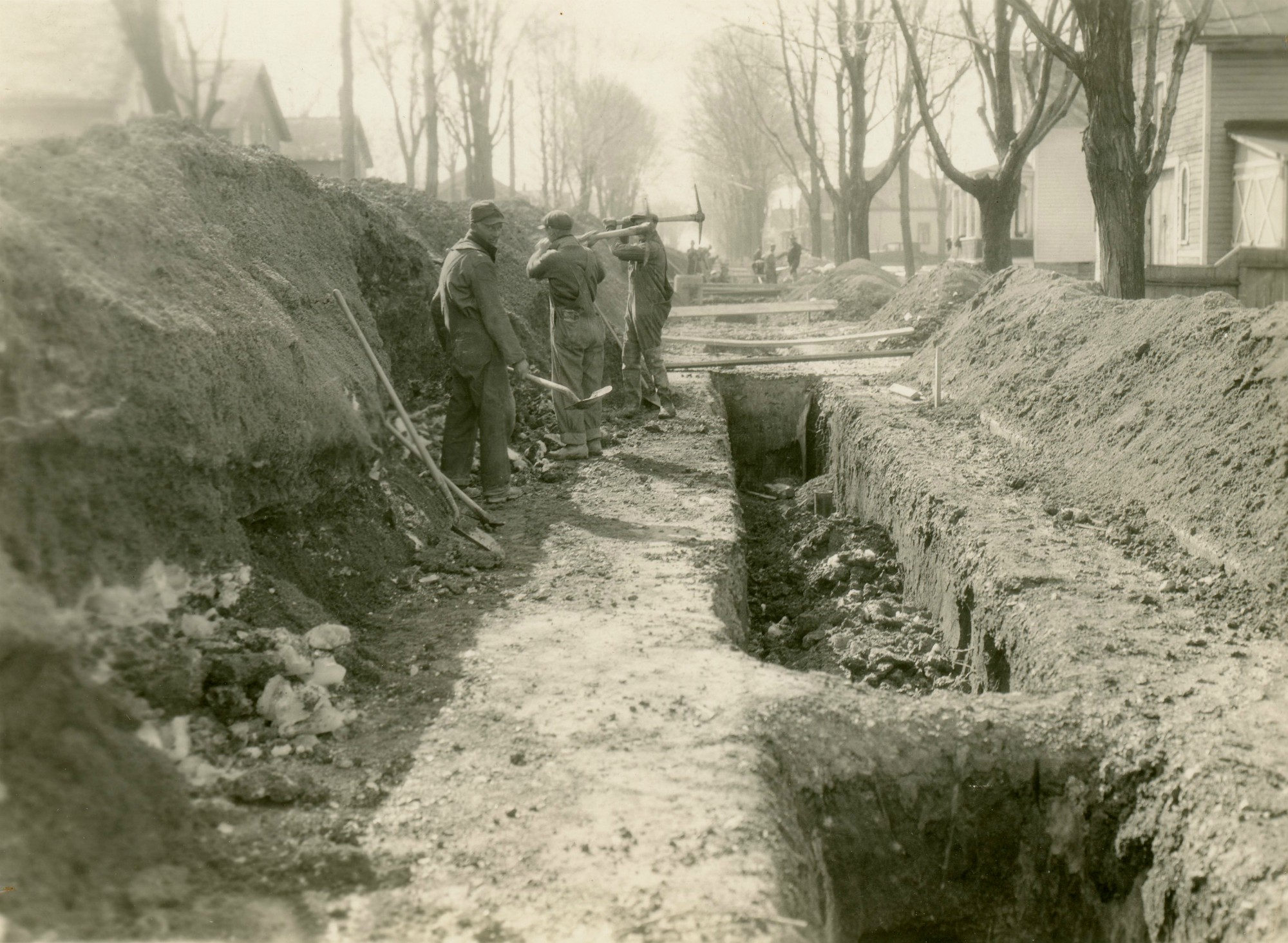 WPA workers digging ditches for road-laying in Ogdensburg
