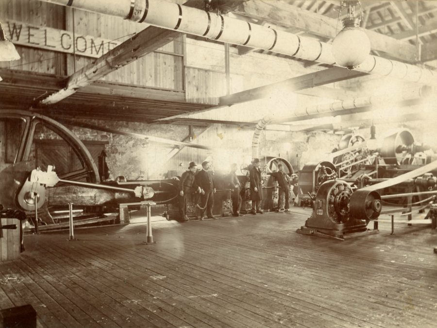 Sawmill workers with coal-fired steam locomotive near Harrisville