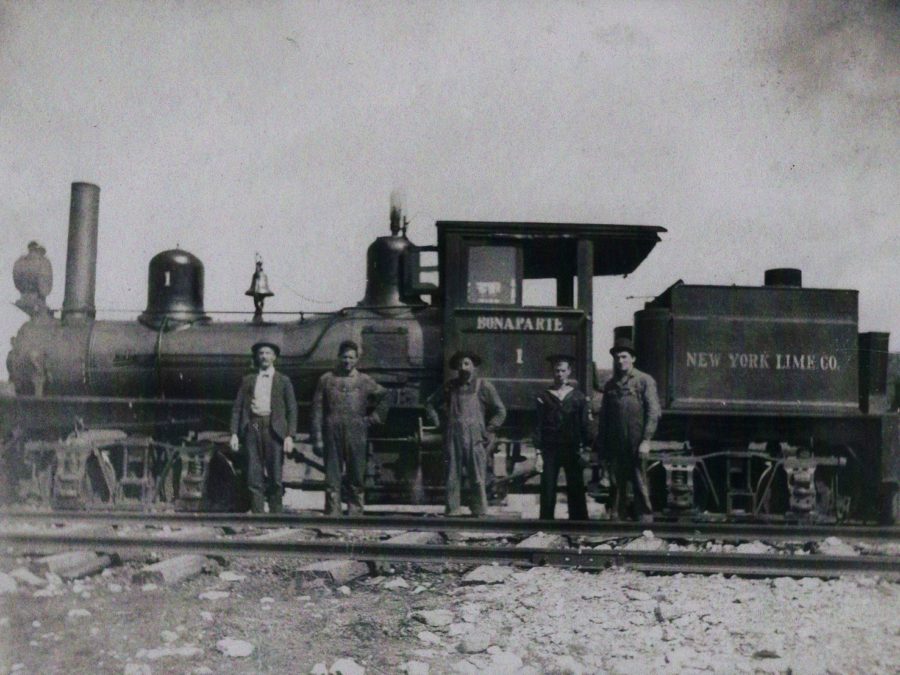 Loading sized rock into railroad cars in a Republic Steel mine in ...