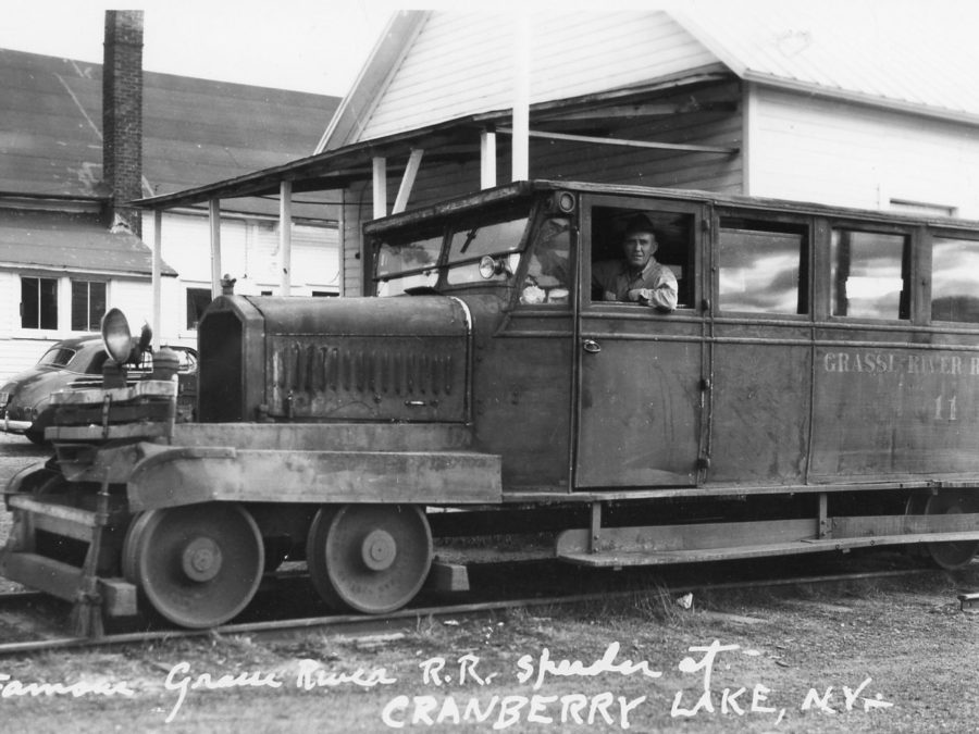 Grasse River Railroad with log loader in Cranberry Lake