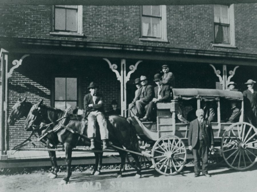 Six-horse stagecoach in front of Paul Smith’s Hotel in Paul Smiths