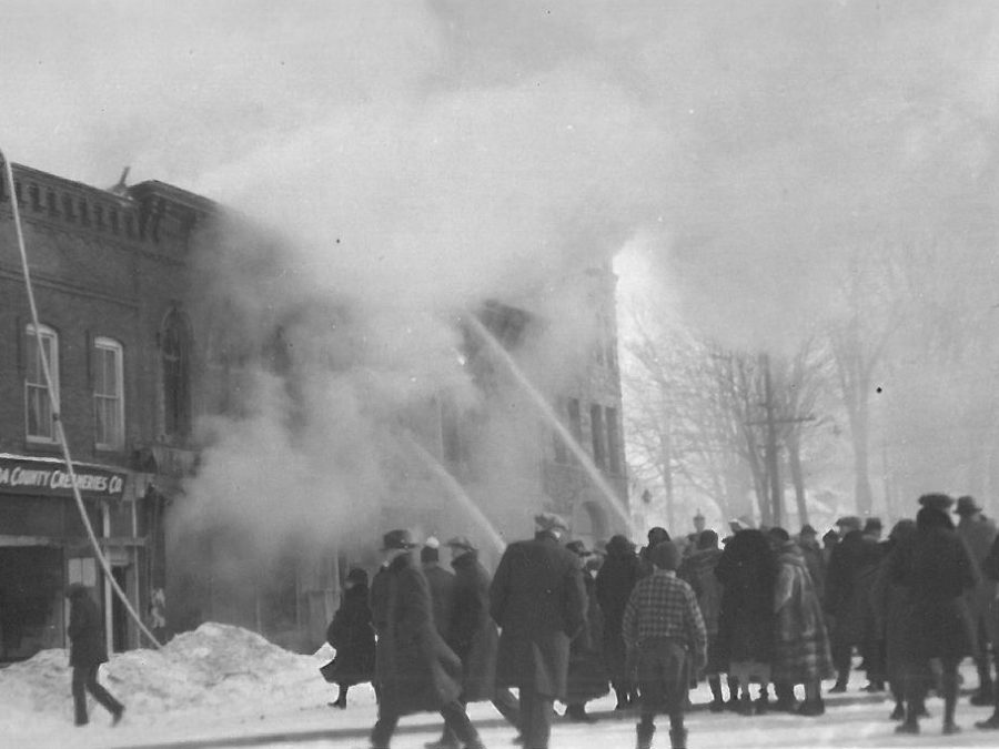 Firefighters battle the Spaulding fire using steam pumper in Canton