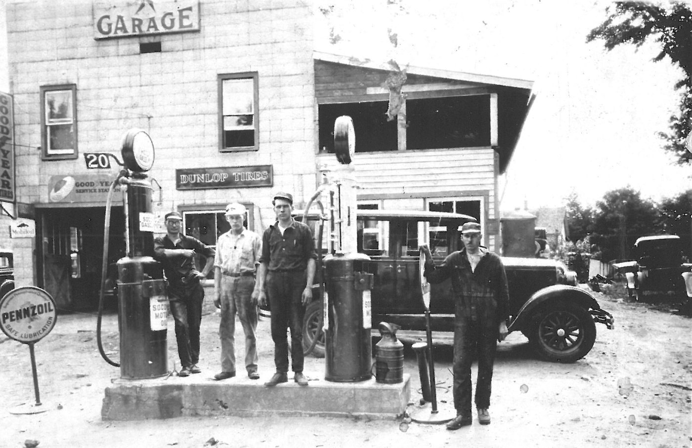 Gas station workers at the Kerr Garage in Fine