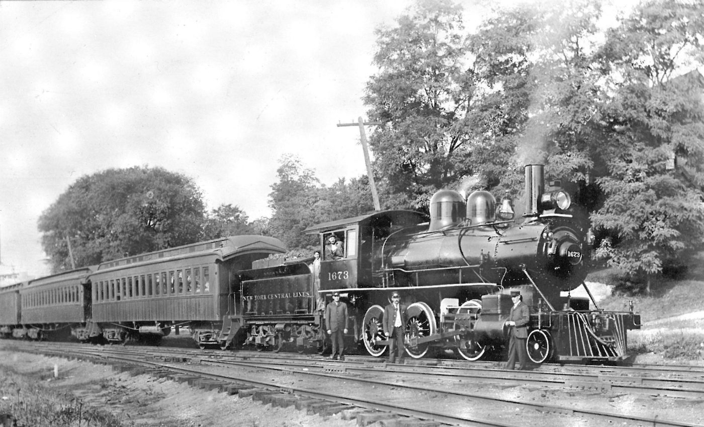 Railroad employees with #1673 Oswegatchie Railroad locomotive in ...