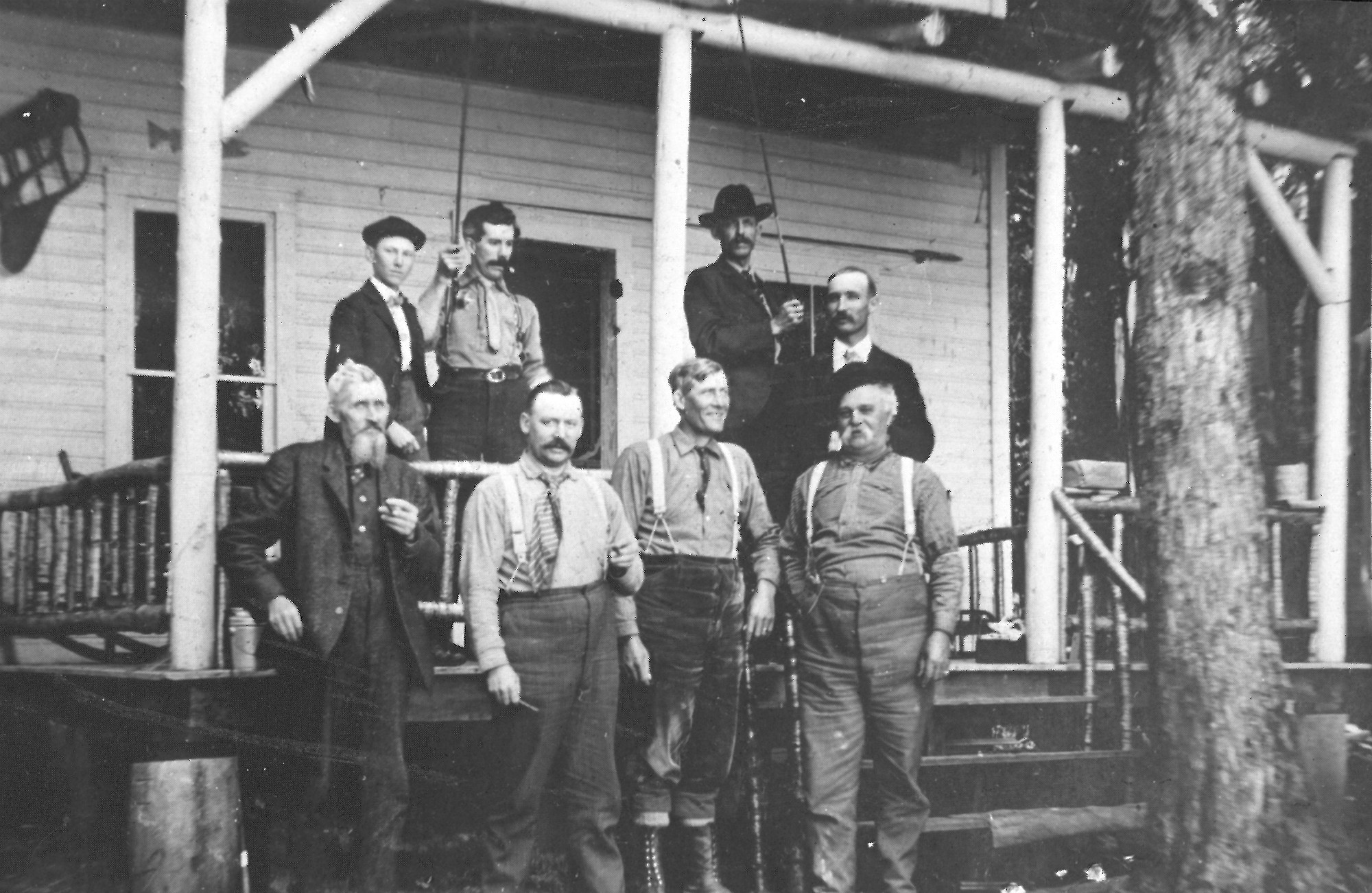 Adirondack hunting guides in front of Howland’s Camp in the Adirondacks