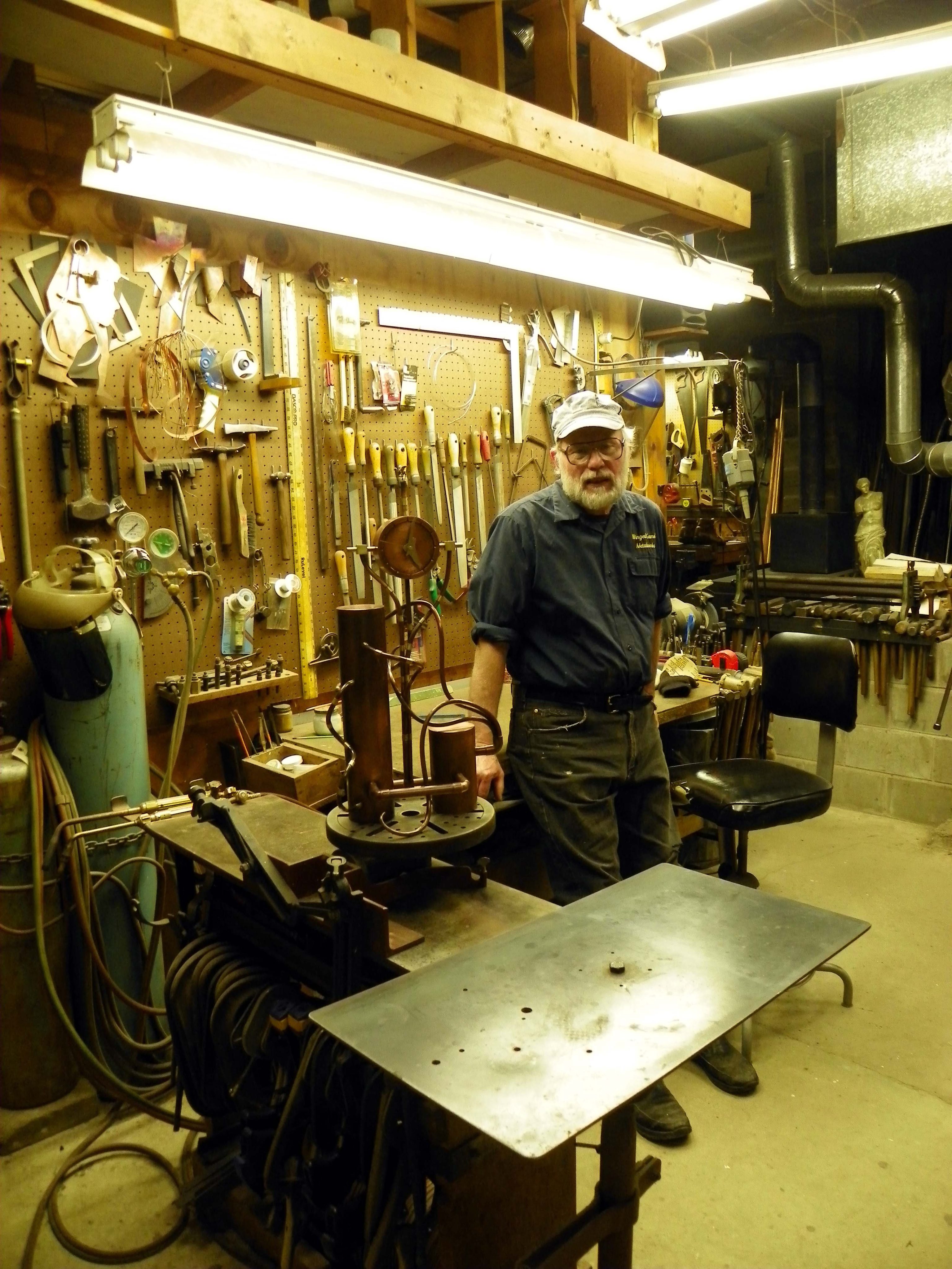 Malcolm Owen inside of his metalworking studio in Pierrepont