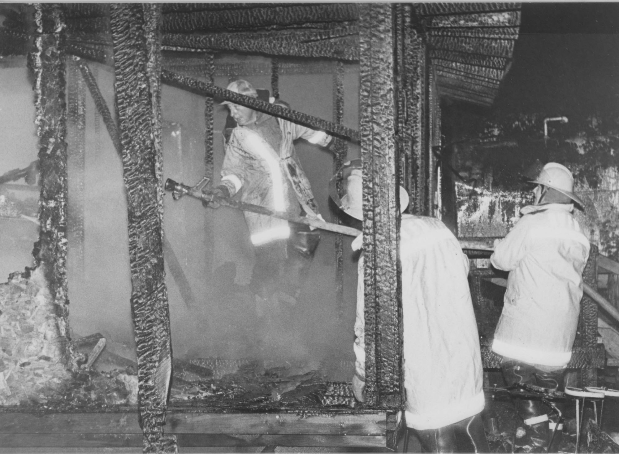 Firefighters put out a fire at the Kelly House in Long Lake