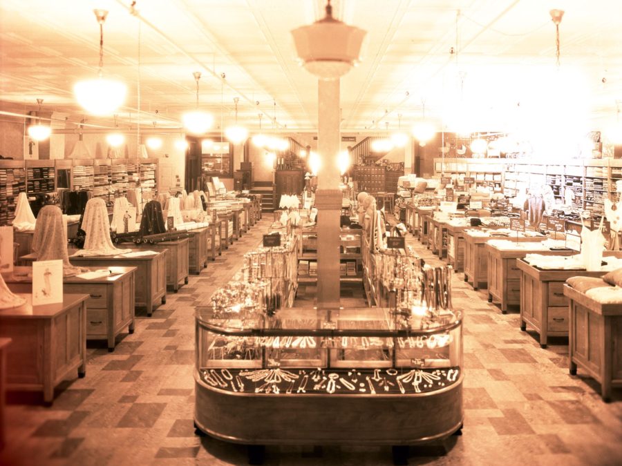 Employees in front of the J.J. Newberry department store in Tupper Lake