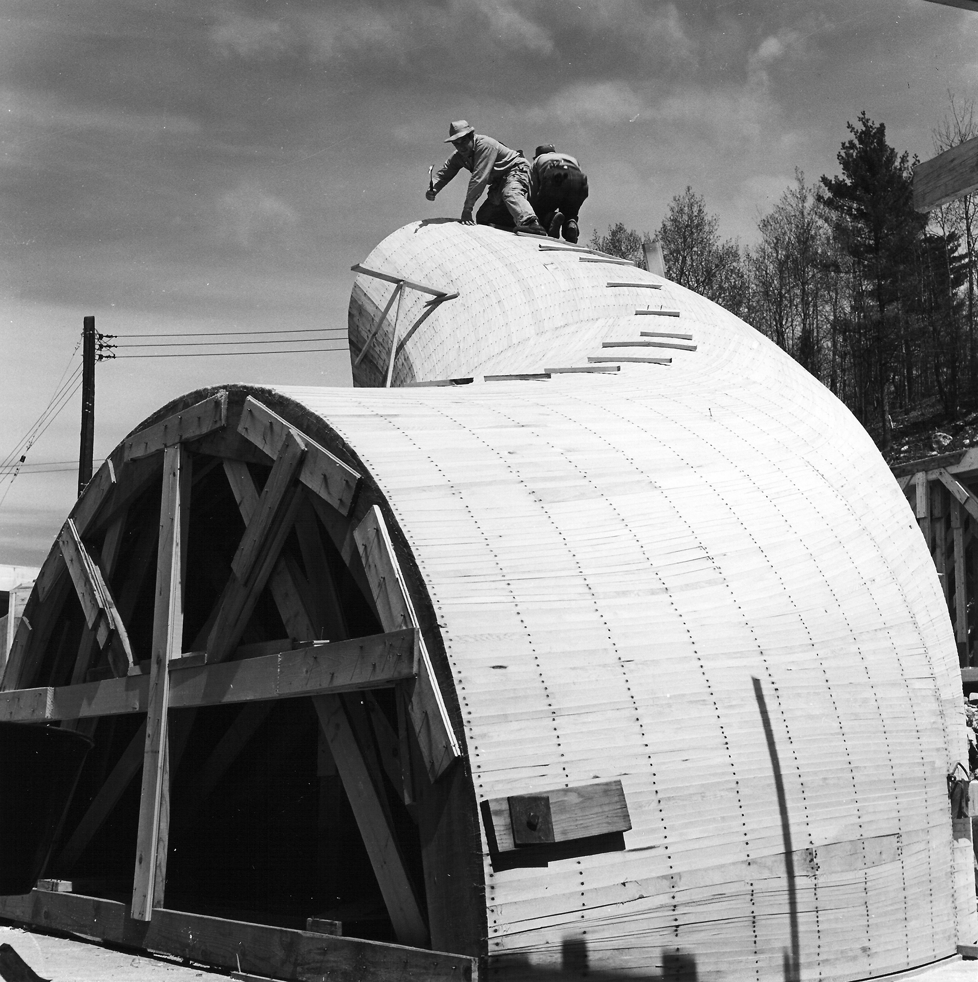 Carpenters constructing a draft tube at the South Colton hydro-electric ...