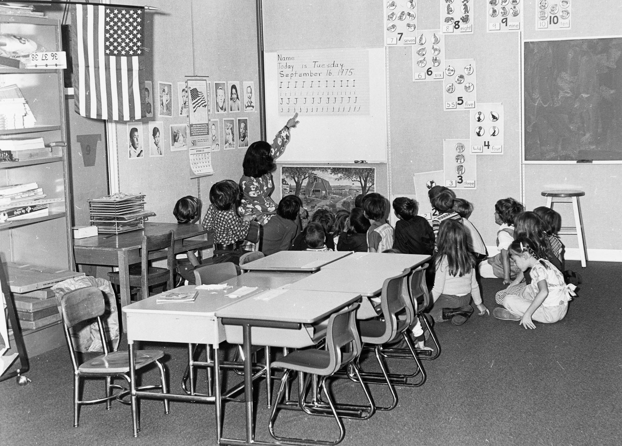 Teacher with students at New Carthage Elementary School.