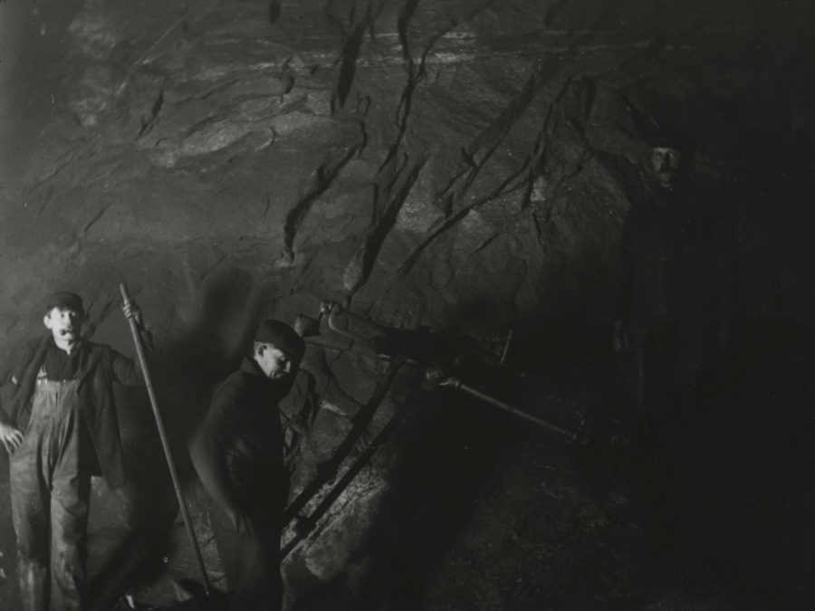 Miners mucking and breaking rocks in the Joker Mine in Mineville