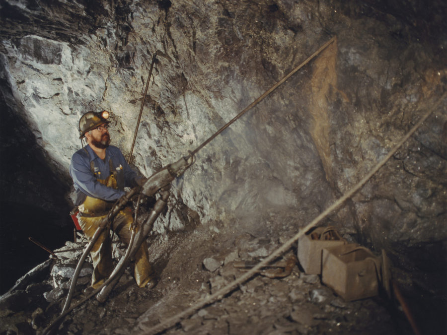 Masked selfie of underground electrician at Empire State Mines in Balmat