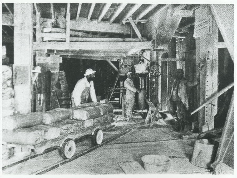 Workers inside the Number 2 1/2 talc mine in Talcville