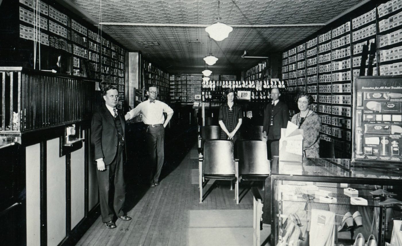 Employees inside G.R. Kinney Company Shoes in Watertown