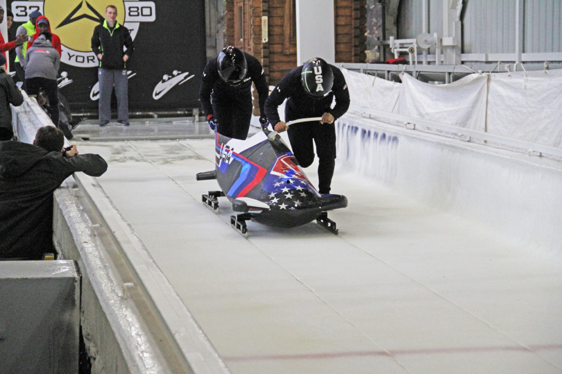 Olympic bobsledders at the Mount Van Hoevenberg sliding track in Lake ...
