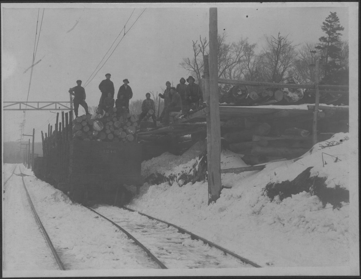 Loading a train car with logs in Tupper Lake