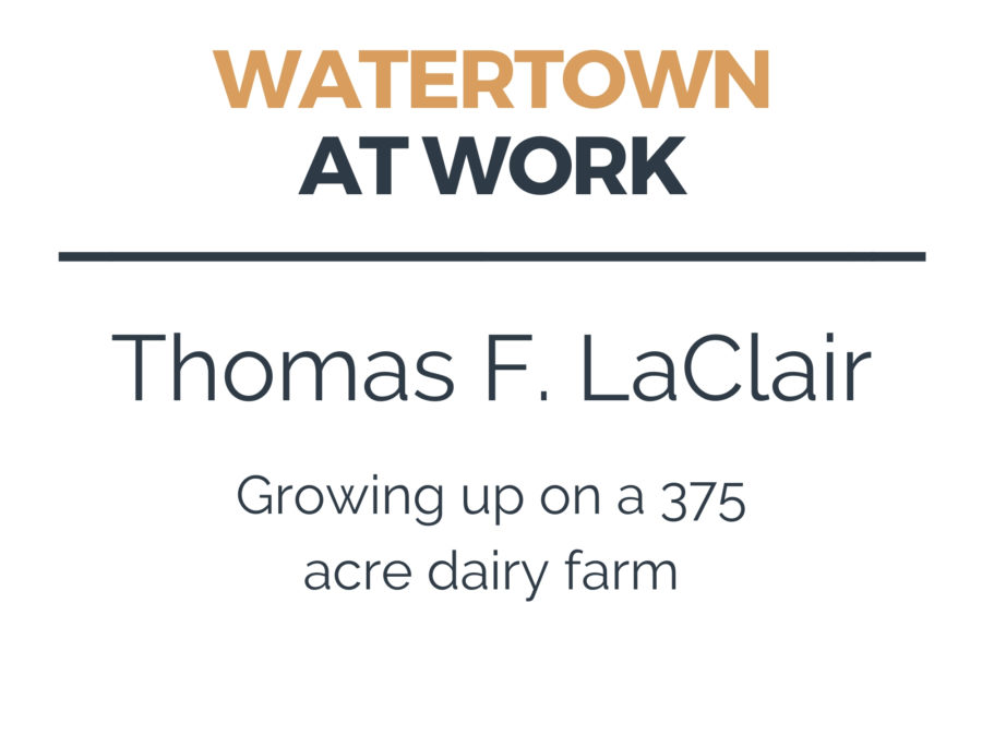 Hadlock family with their tractor on their dairy farm in Hammond